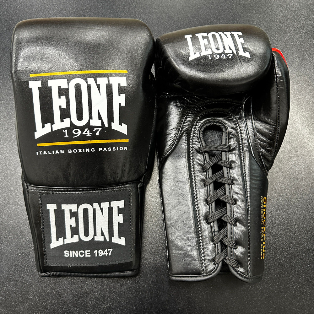 Боксерские перчатки Leone 1947 на шнуровке черные купить на OZON по низкой цене (2842688555)