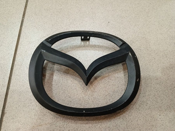 Эмблема решетки радиатора Mazda 3 bk 2003-2009 C23551731A купить на ...