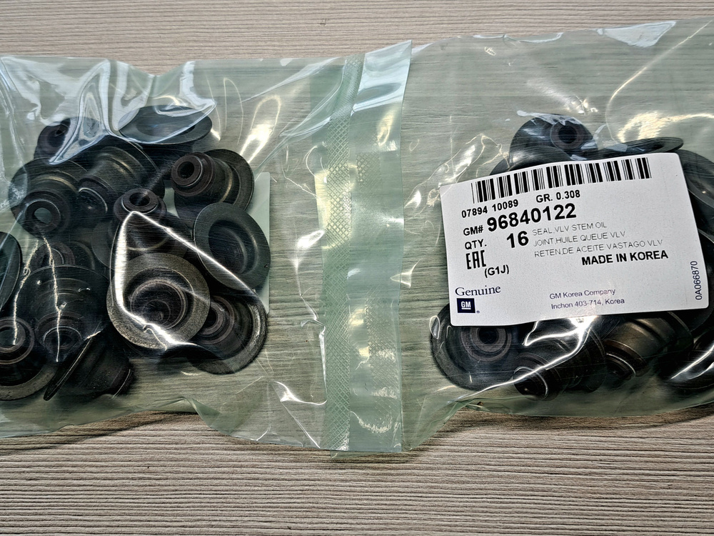 Сальники клапанов GM DOHC комплект 16 штук оригинал Нексия Лачетти Авео ...