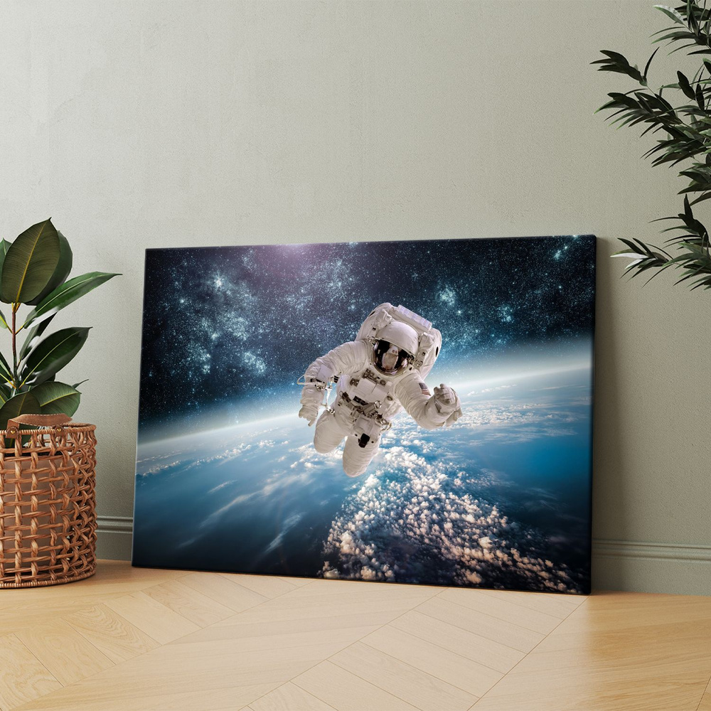 Картина на холсте (Космонавт в открытом космосе на фоне Земли) 30x40 см ...