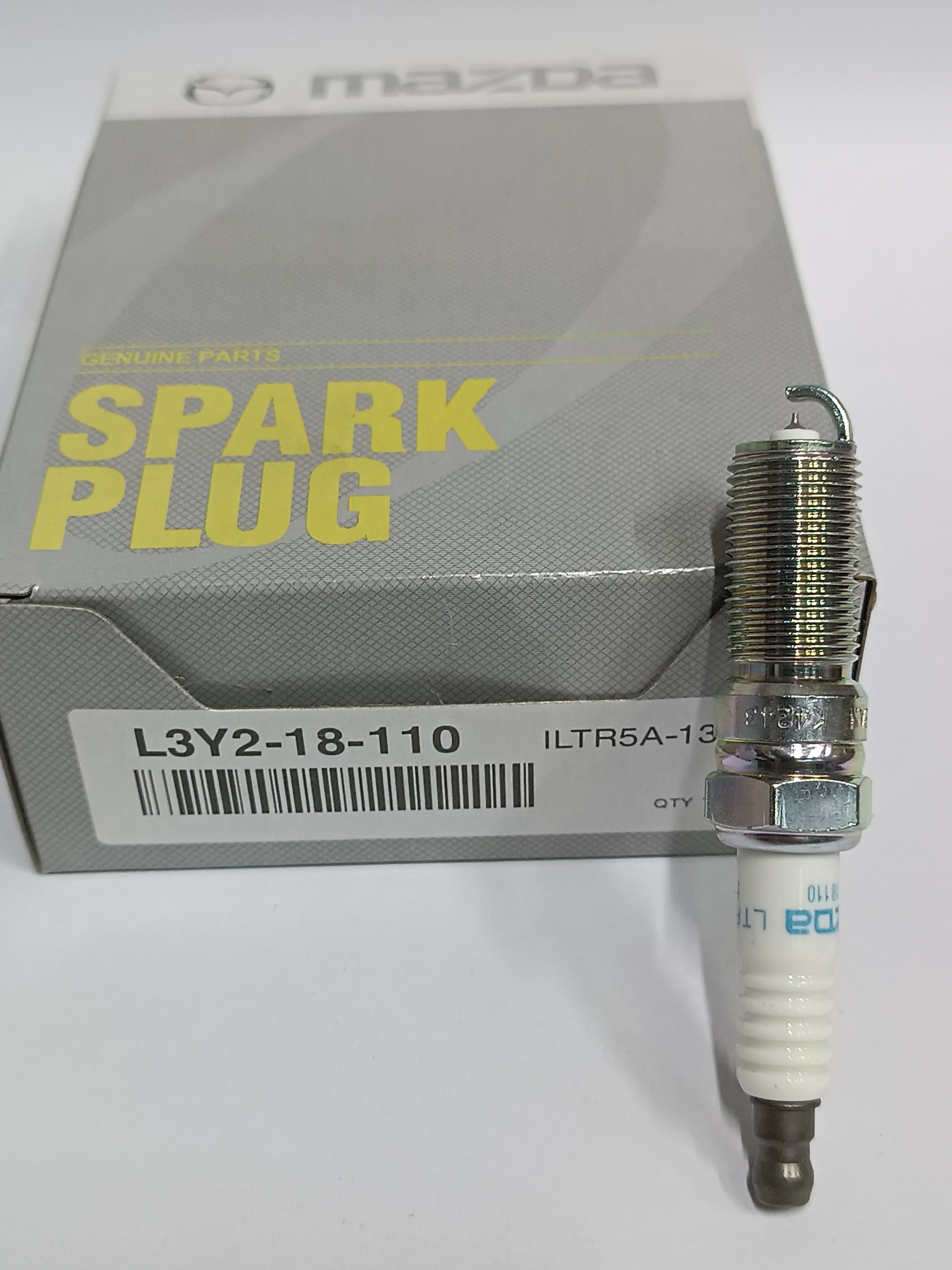Свеча зажигания арт. L3Y218110 купить на OZON по низкой цене (1051359957)