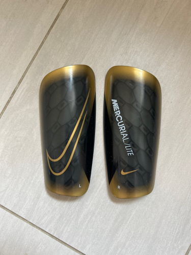 DN3611-013 Футбольные щитки Nike Mercurial Lite купить на OZON по ...